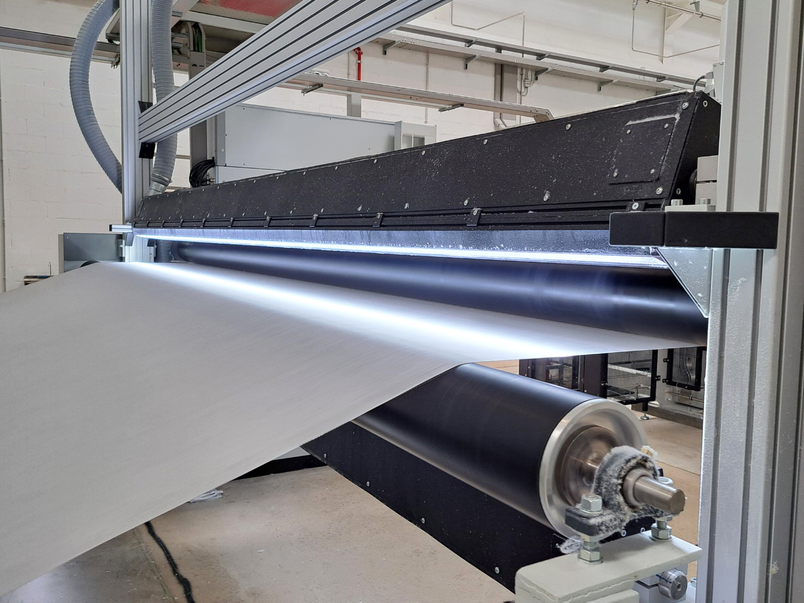 Automated surface inspection for nonwoven quality